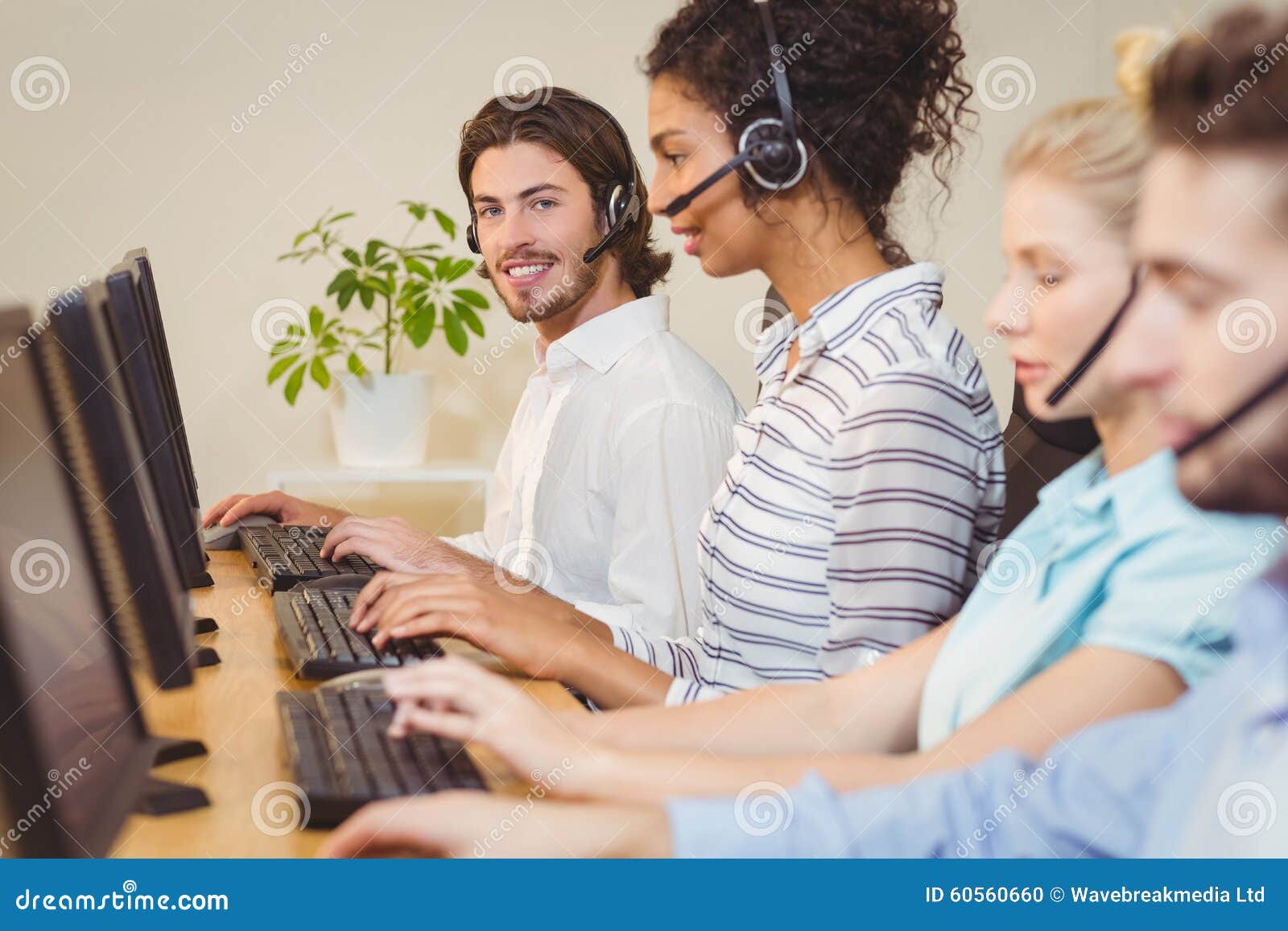 Portrait of Smiling Executive in Call Center Stock Photo - Image of ...