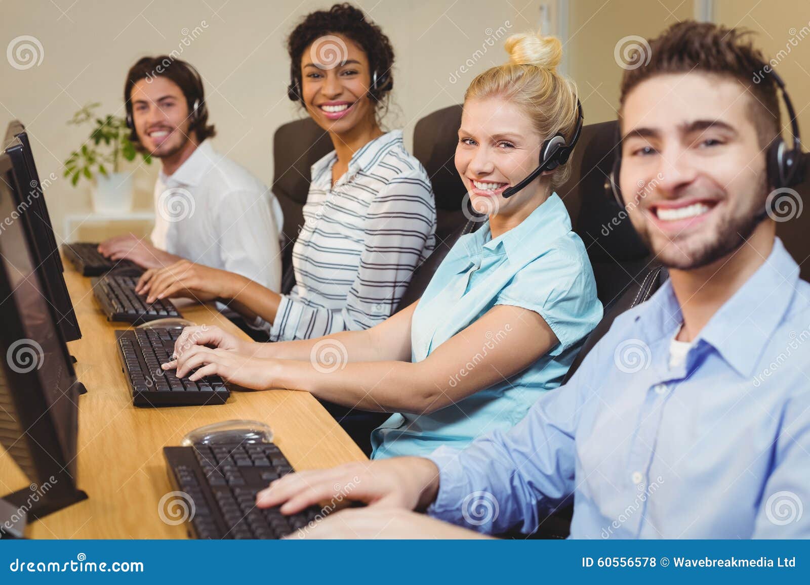 Portrait of Smiling Executives in Call Center Stock Photo - Image of ...
