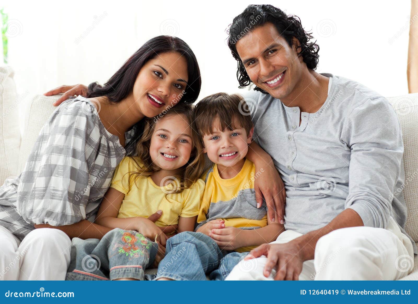 Portrait of a Smiling Family Stock Image - Image of home, four: 12640419