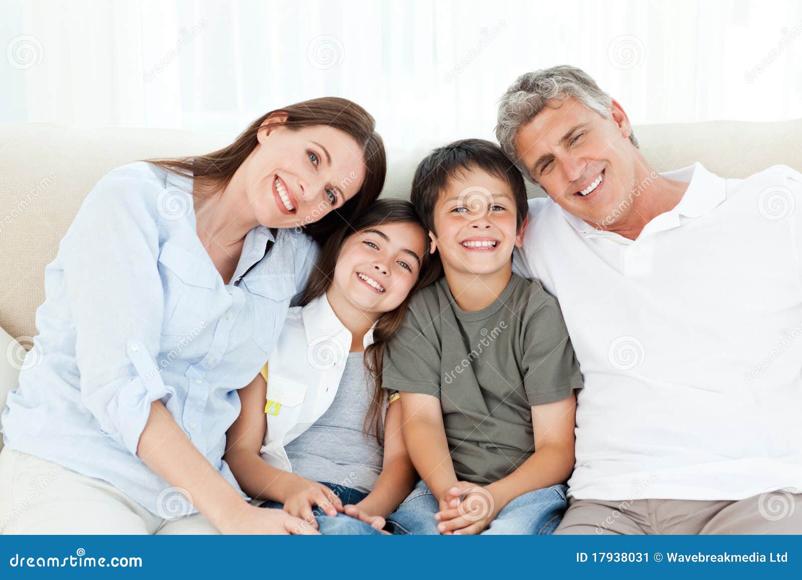 Portrait of a Smiling Family Stock Image - Image of lounge, home: 17938031