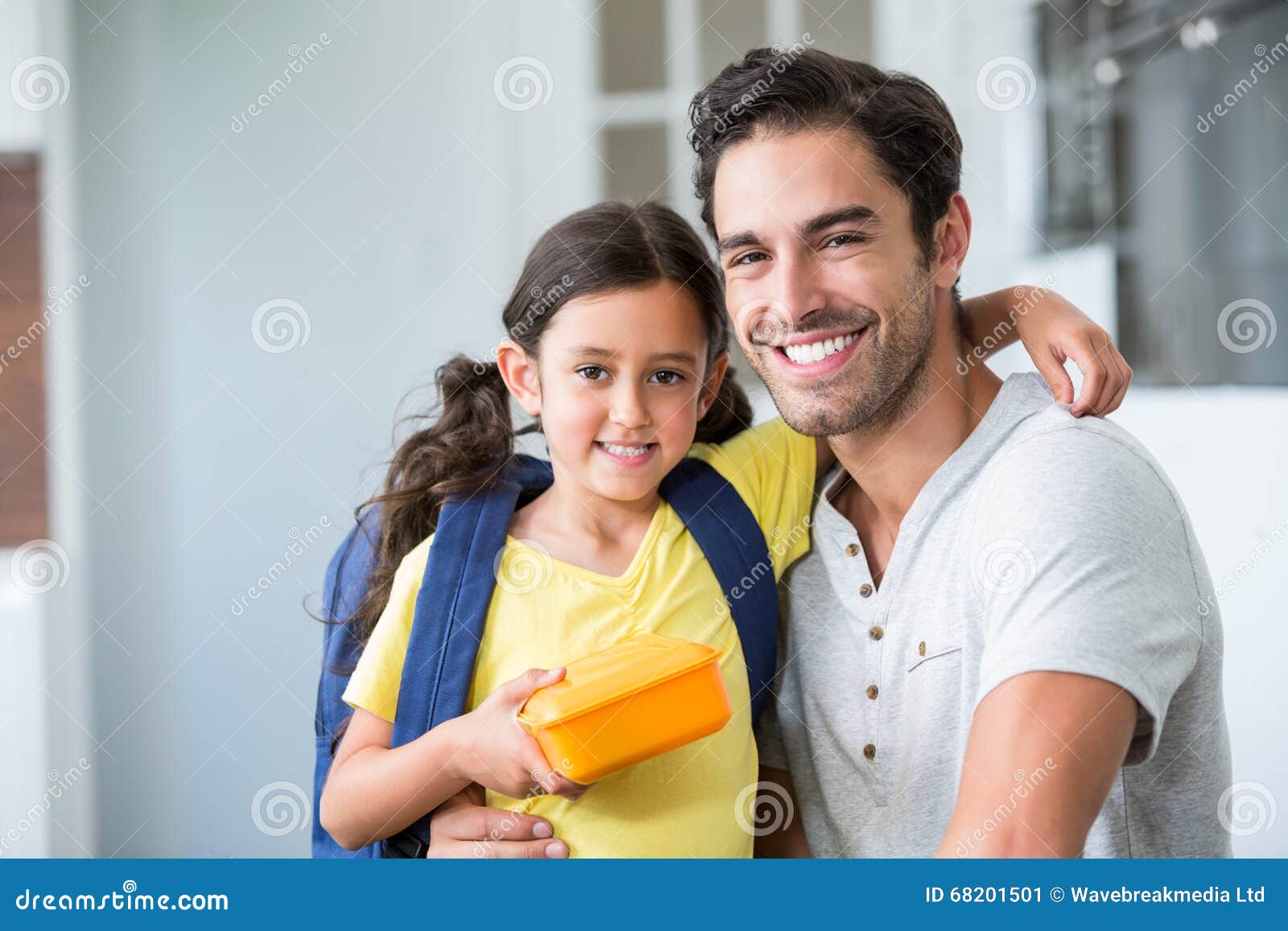 Portrait of Smiling Father and Daughter with Lunch Box Stock Image ...