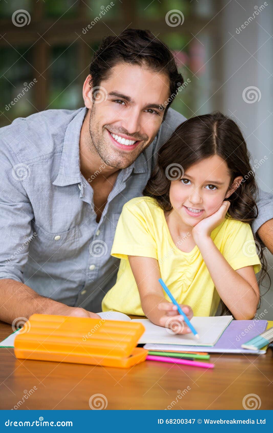 Portrait of Smiling Father and Daughter Studying Stock Image - Image of ...