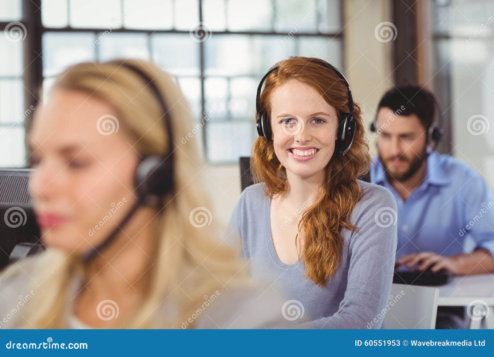 Portrait of Smiling Female Operator Stock Image - Image of brunette ...