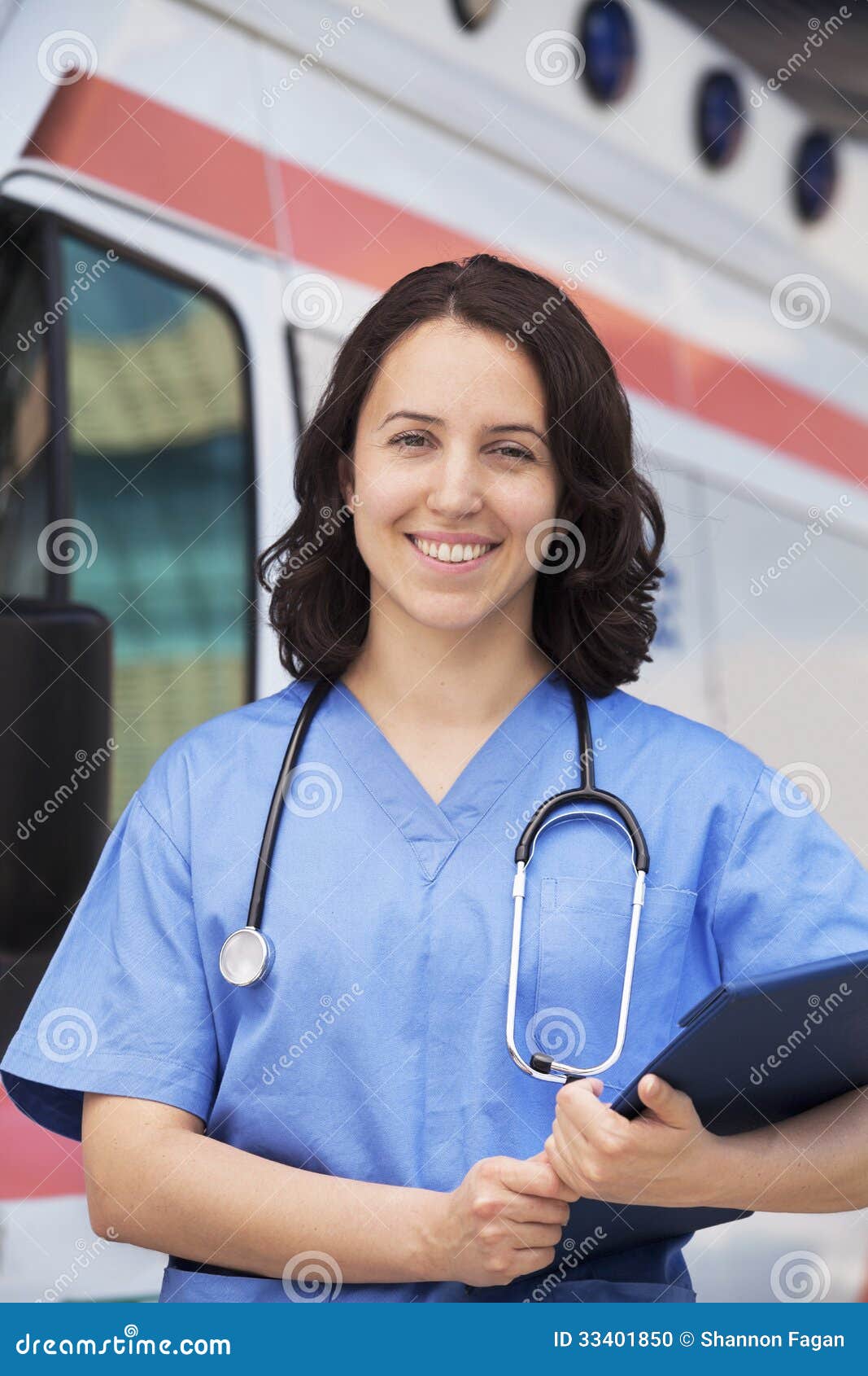 Portrait of Smiling Female Paramedic in Front of am Ambulance Stock ...