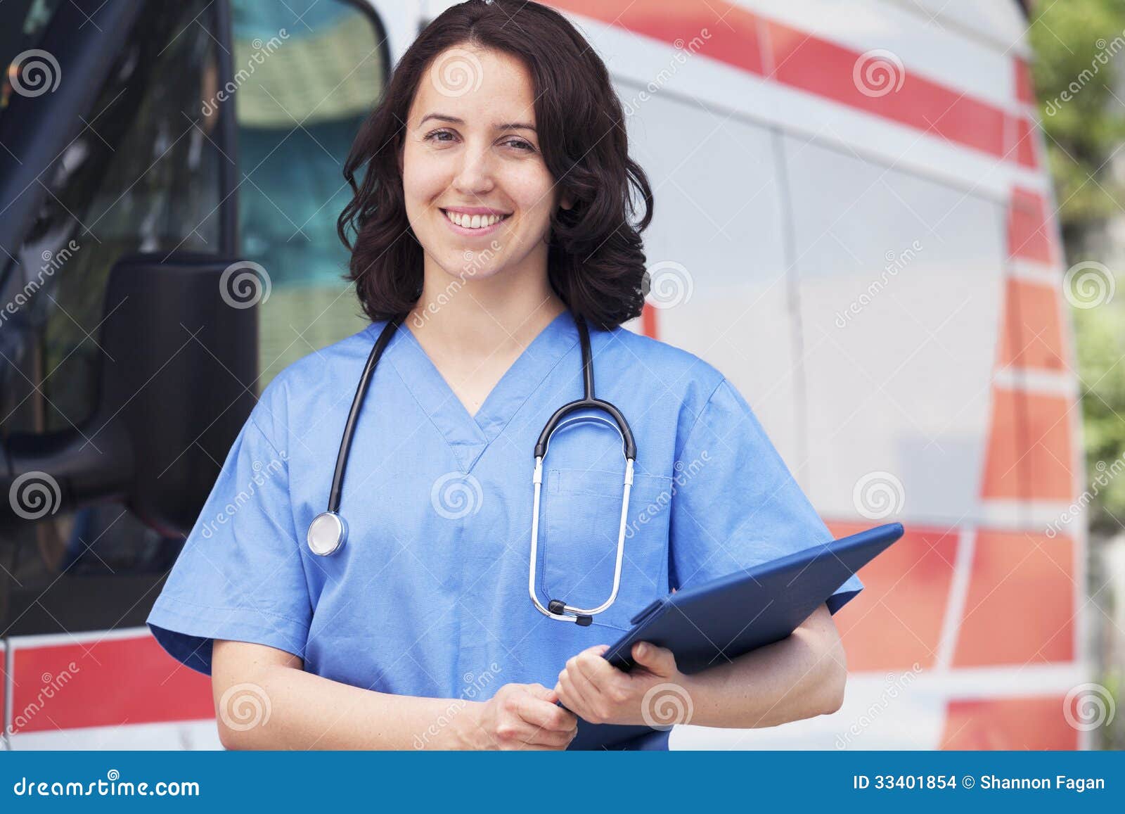 Portrait of Smiling Female Paramedic in Front of am Ambulance Stock ...