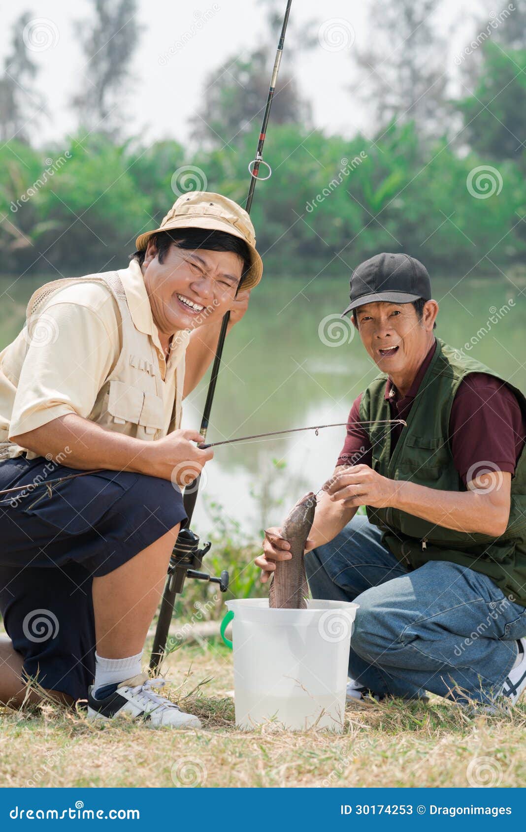 Excited fishermen stock image. Image of leisure, lake - 30174253