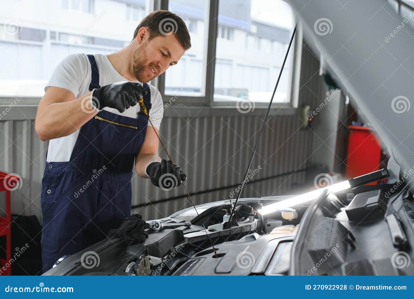 Portrait of a Smiling Fixing a Car Engine in His Garage Stock Photo ...