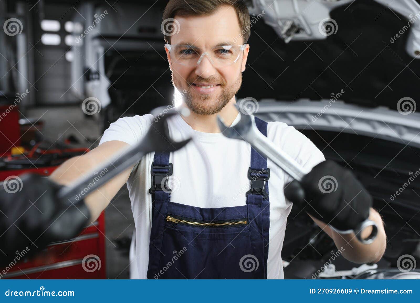 Portrait of a Smiling Fixing a Car Engine in His Garage Stock Image ... Portrait of a Smiling Fixing a Car Engine in His Garage Stock Image ...