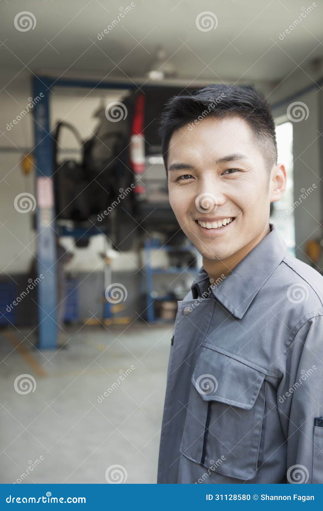 Portrait of Smiling Garage Mechanic Stock Photo - Image of smiling ...