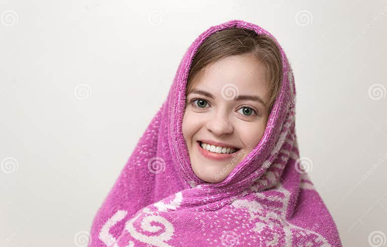 Portrait Of Smiling Girl And Wet Hair Wrapped In Big Towel After