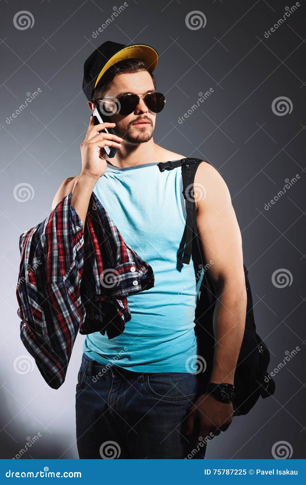 Portrait of Smiling Guy with Backpack Talking Via Mobile Smartphone ...