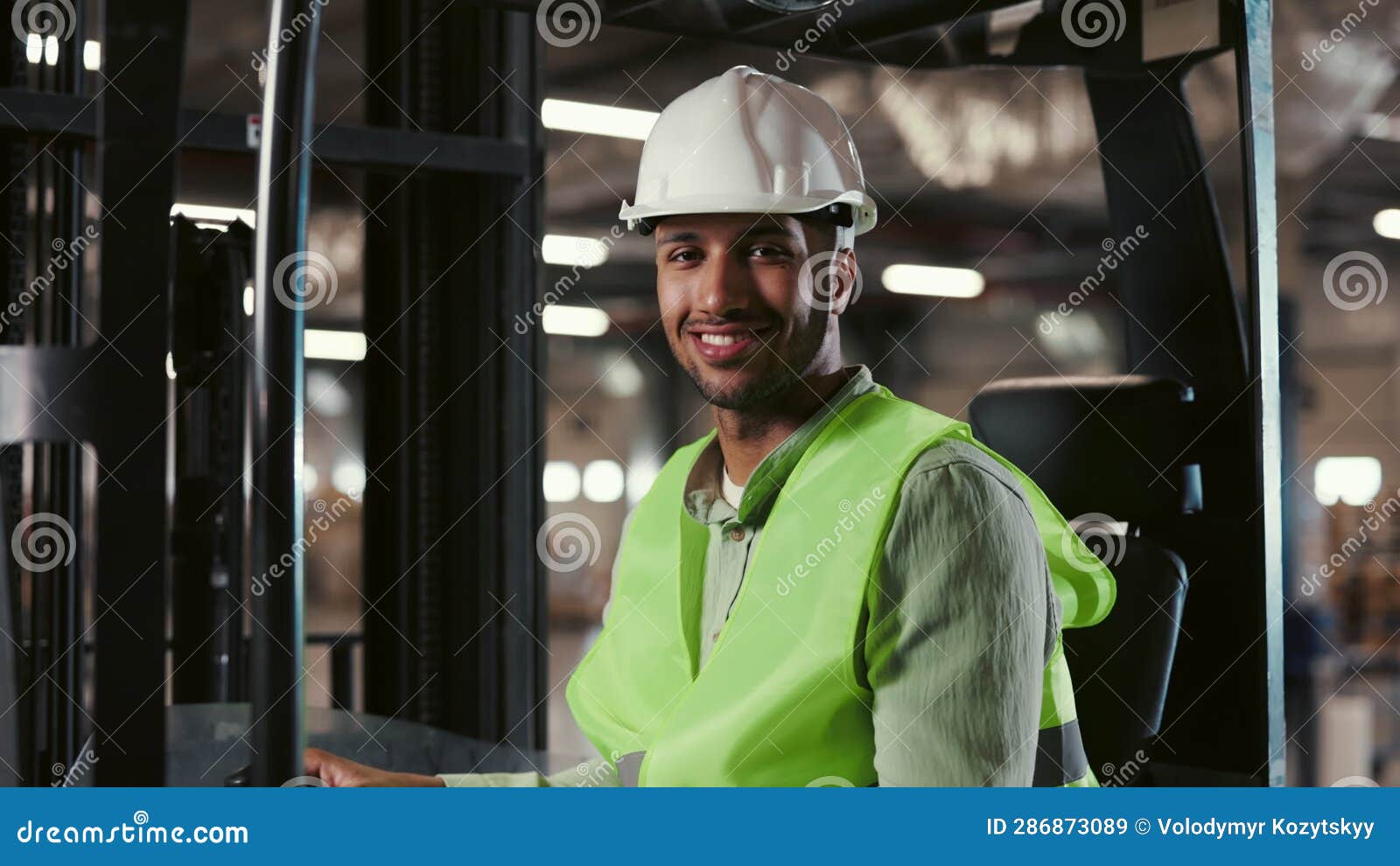 Portrait of Smiling Handsome Diverse Forklift Rider Inside Warehouse ...