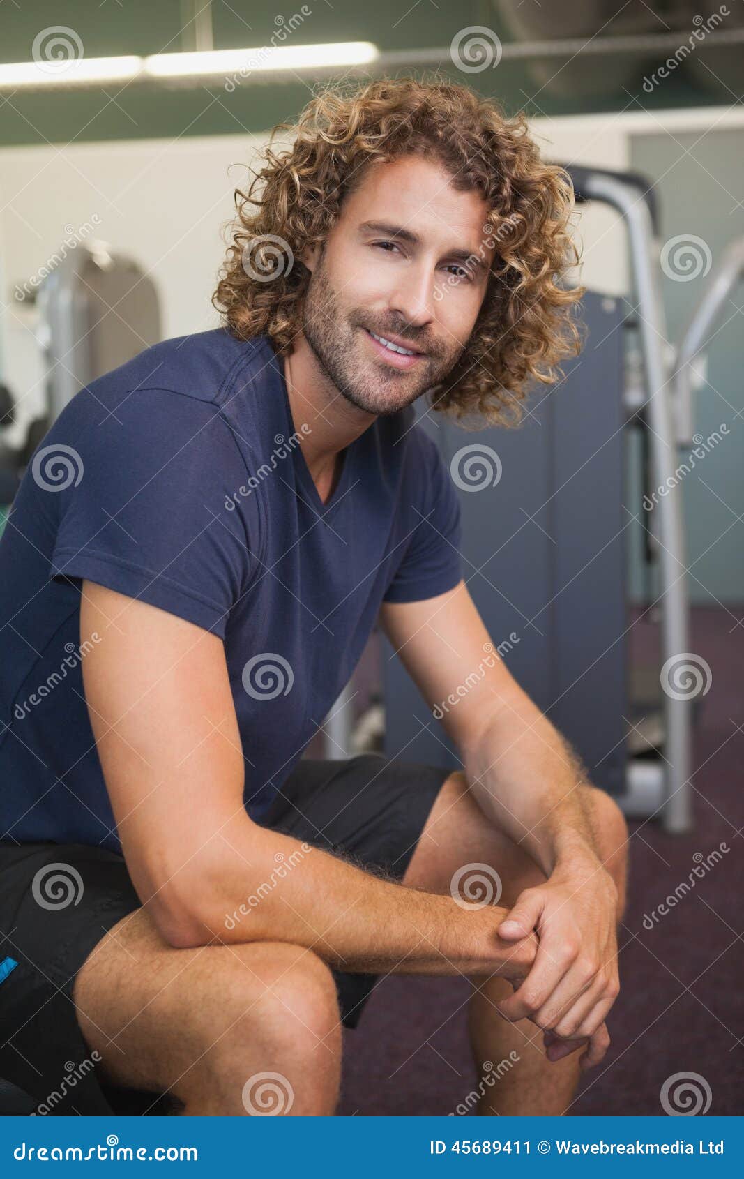 Portrait of a Smiling Handsome Trainer in Gym Stock Image - Image of ...