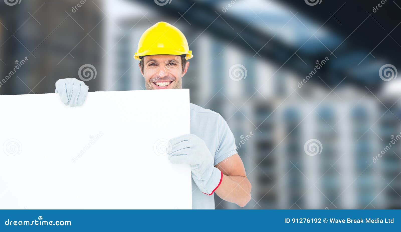 Portrait of Smiling Male Architect Holding Blank Billboard at ... Portrait of Smiling Male Architect Holding Blank Billboard at ...