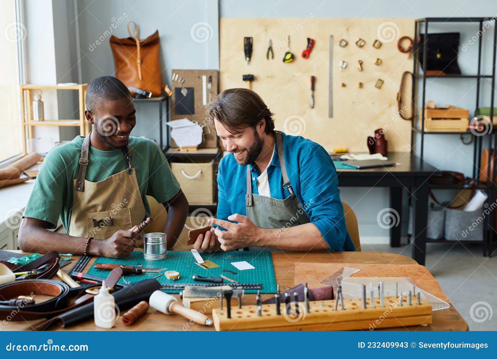 Two Men Enjoying Work in Workshop Stock Image - Image of disability ...