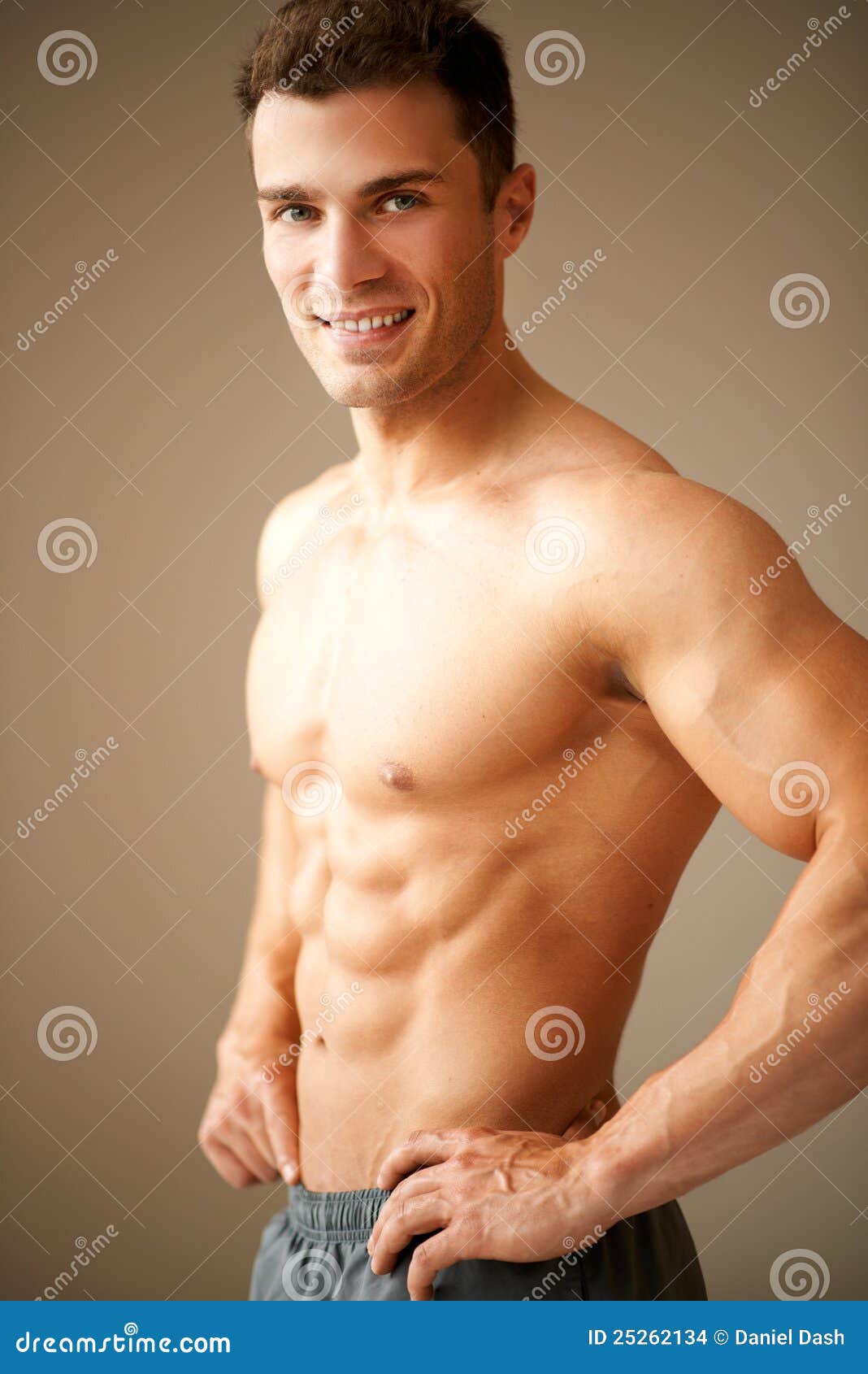Portrait of Smiling Man with Hand on His Hips Stock Photo - Image of ...