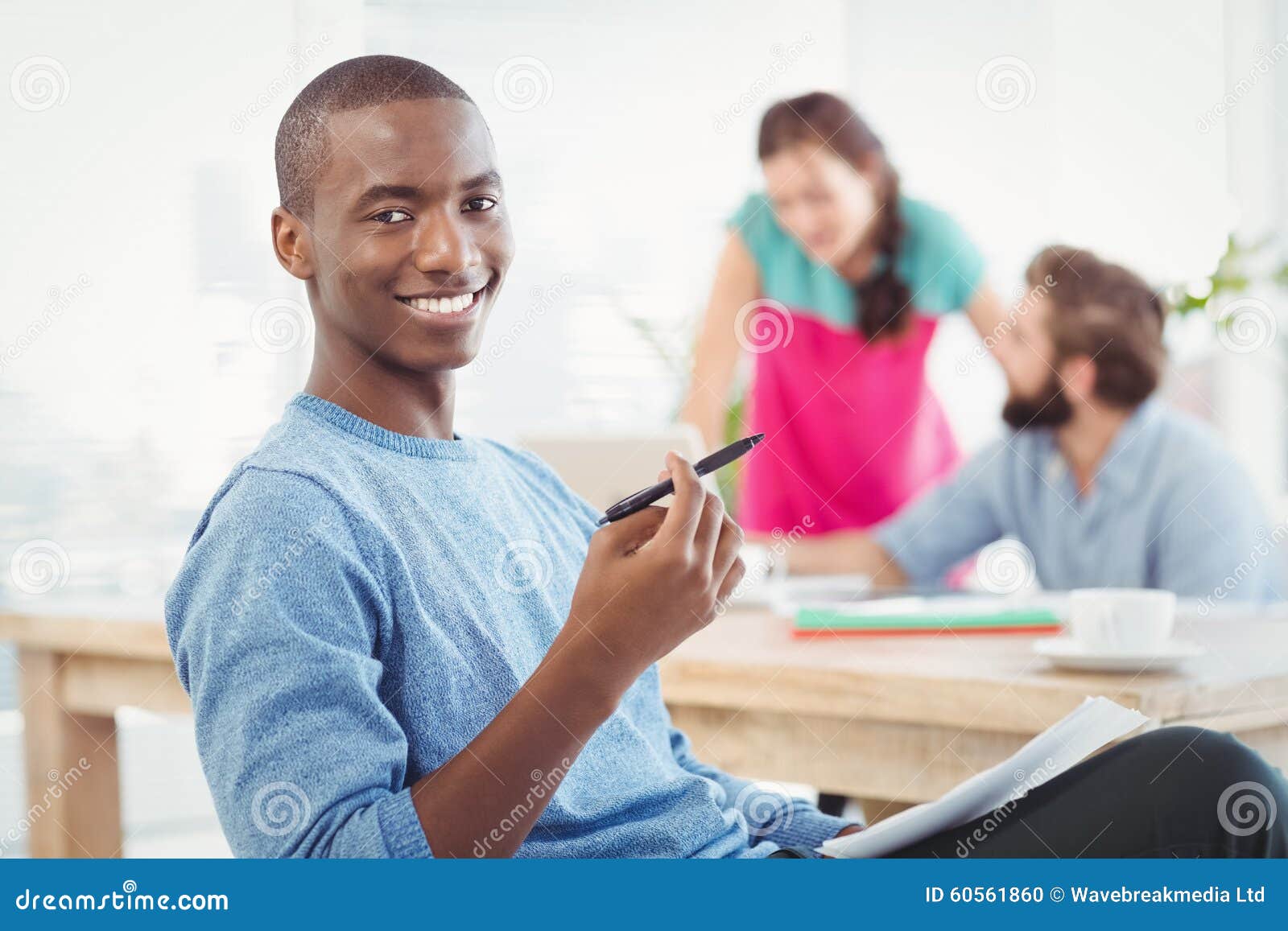 Portrait of Smiling Man Holding Pen Stock Photo - Image of elegant ...