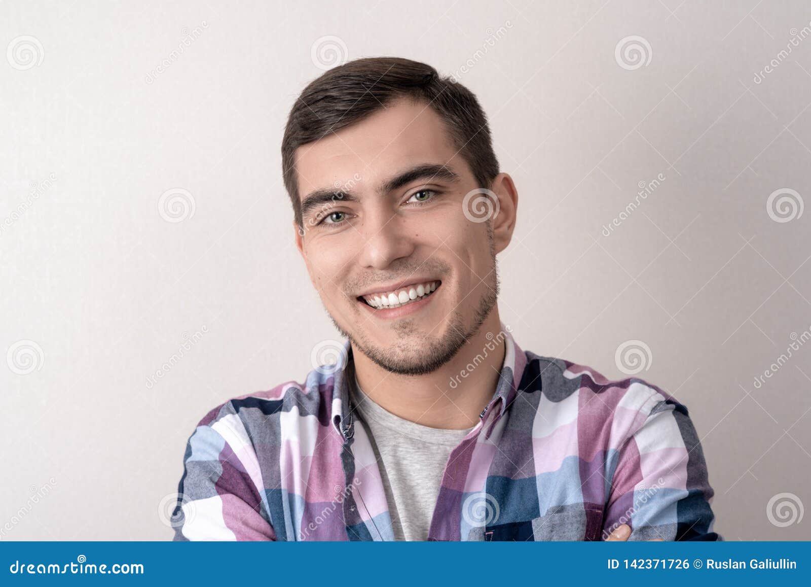 Portrait of Smiling Man on Light Background Stock Photo - Image of ...