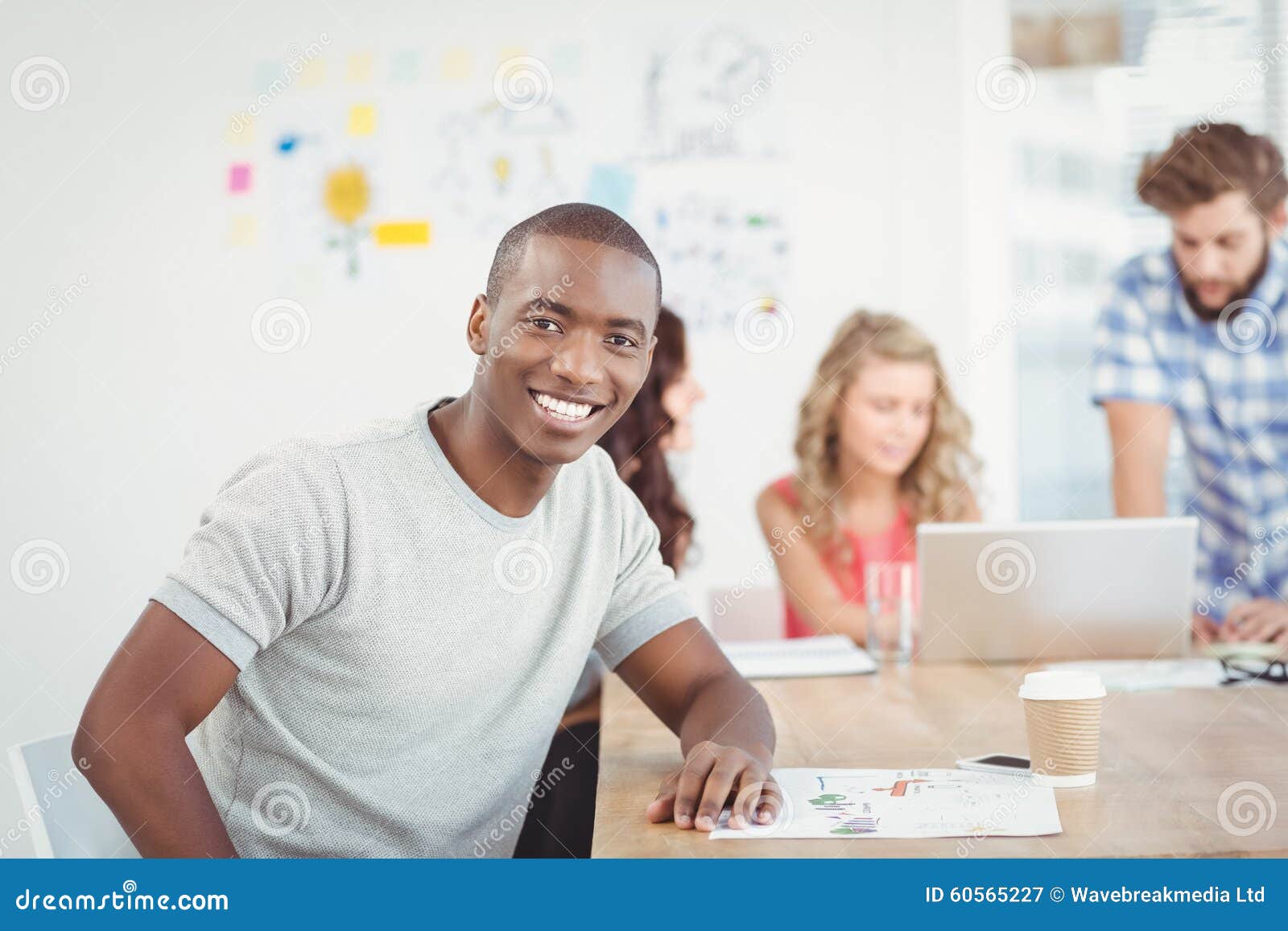 Portrait of Smiling Man while Sitting at Desk Stock Image - Image of ...