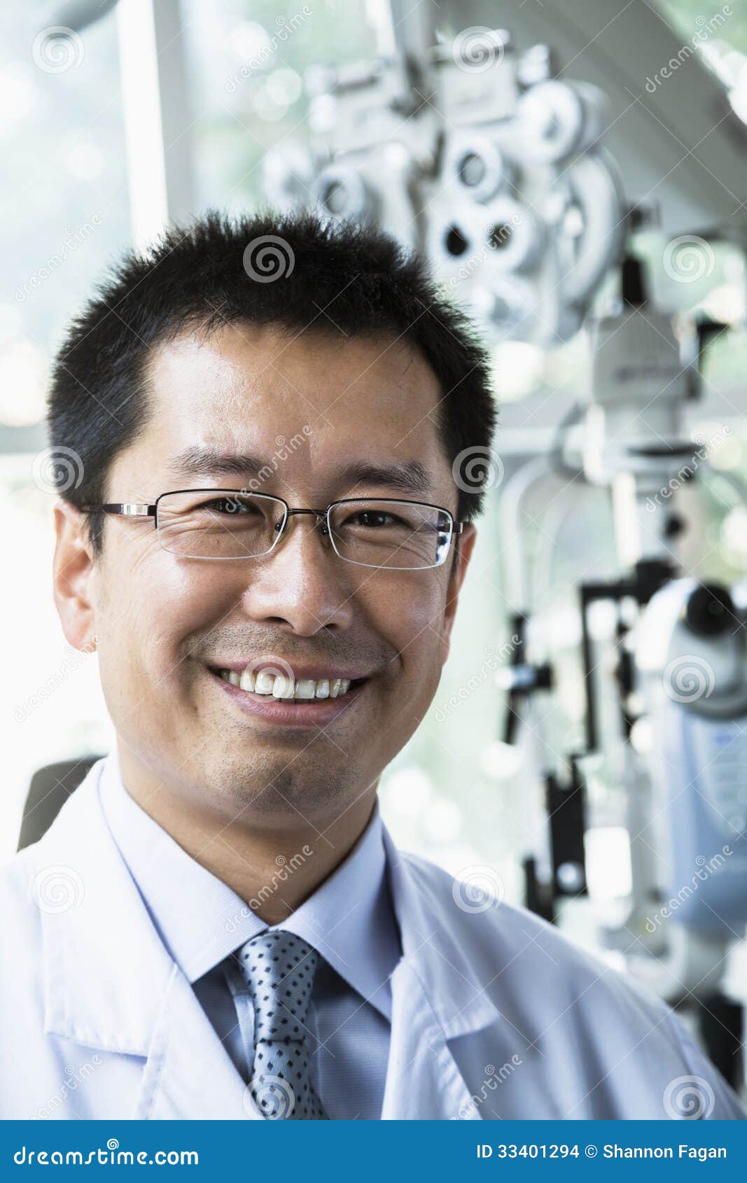Portrait of Smiling Optometrist in His Clinic Stock Photo - Image of ...
