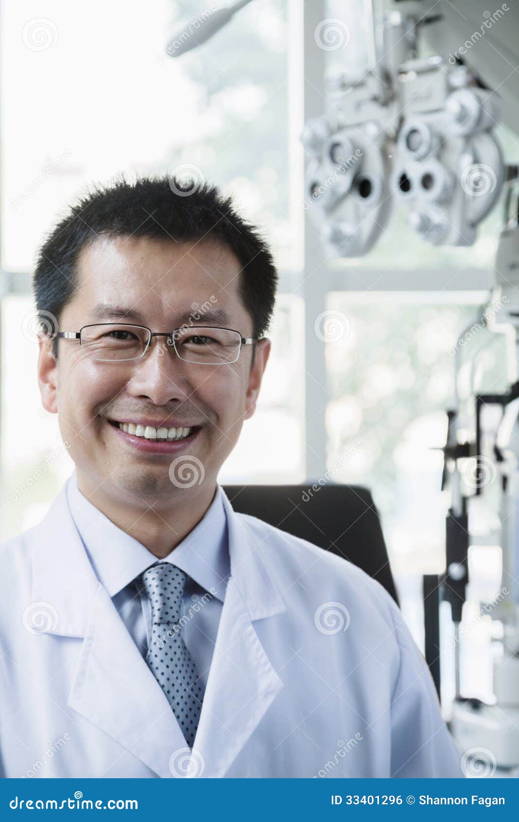 Portrait of Smiling Optometrist in His Clinic Stock Photo - Image of ...