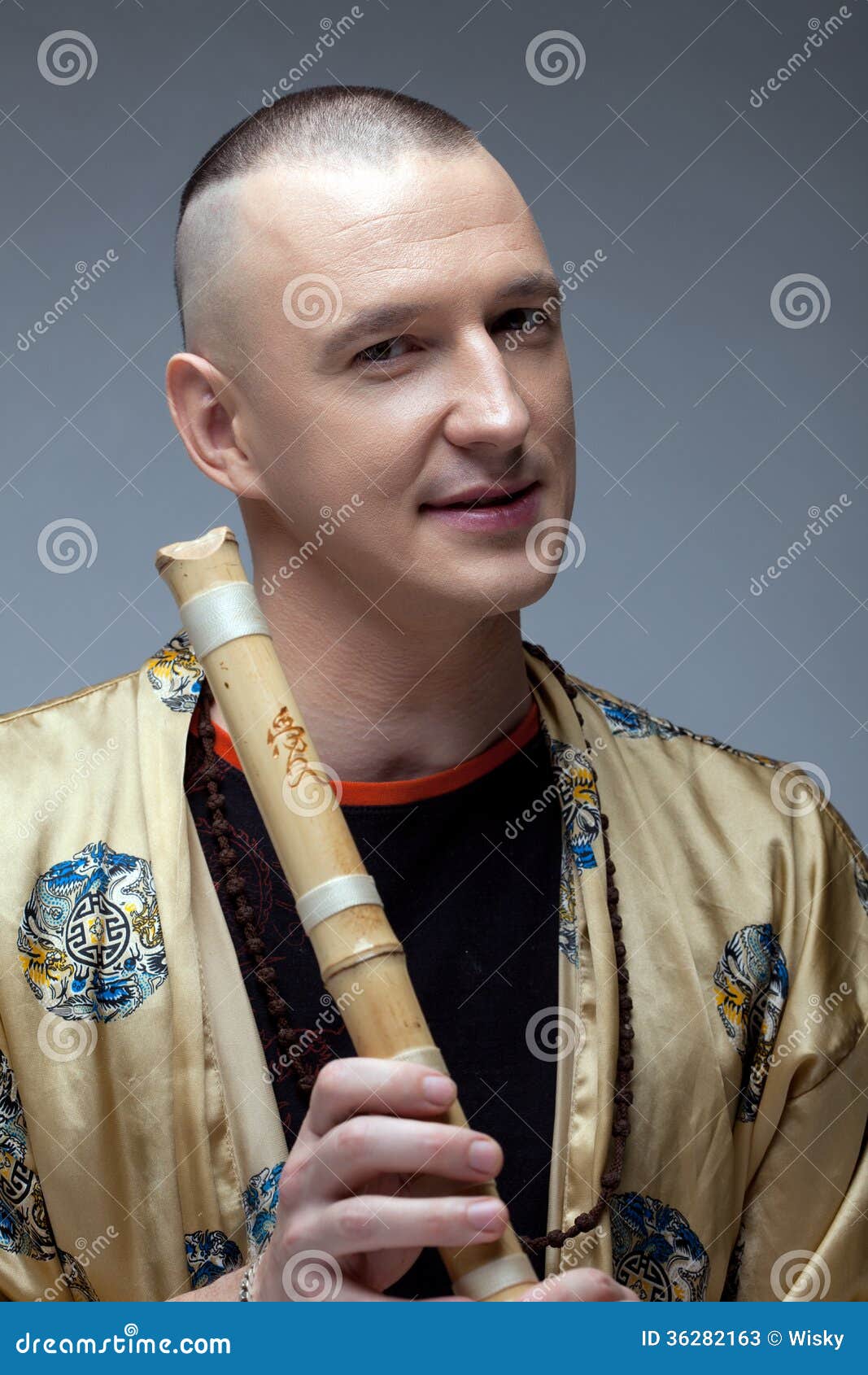 Portrait of Smiling Relaxed Man Playing Flute Stock Image - Image of ...