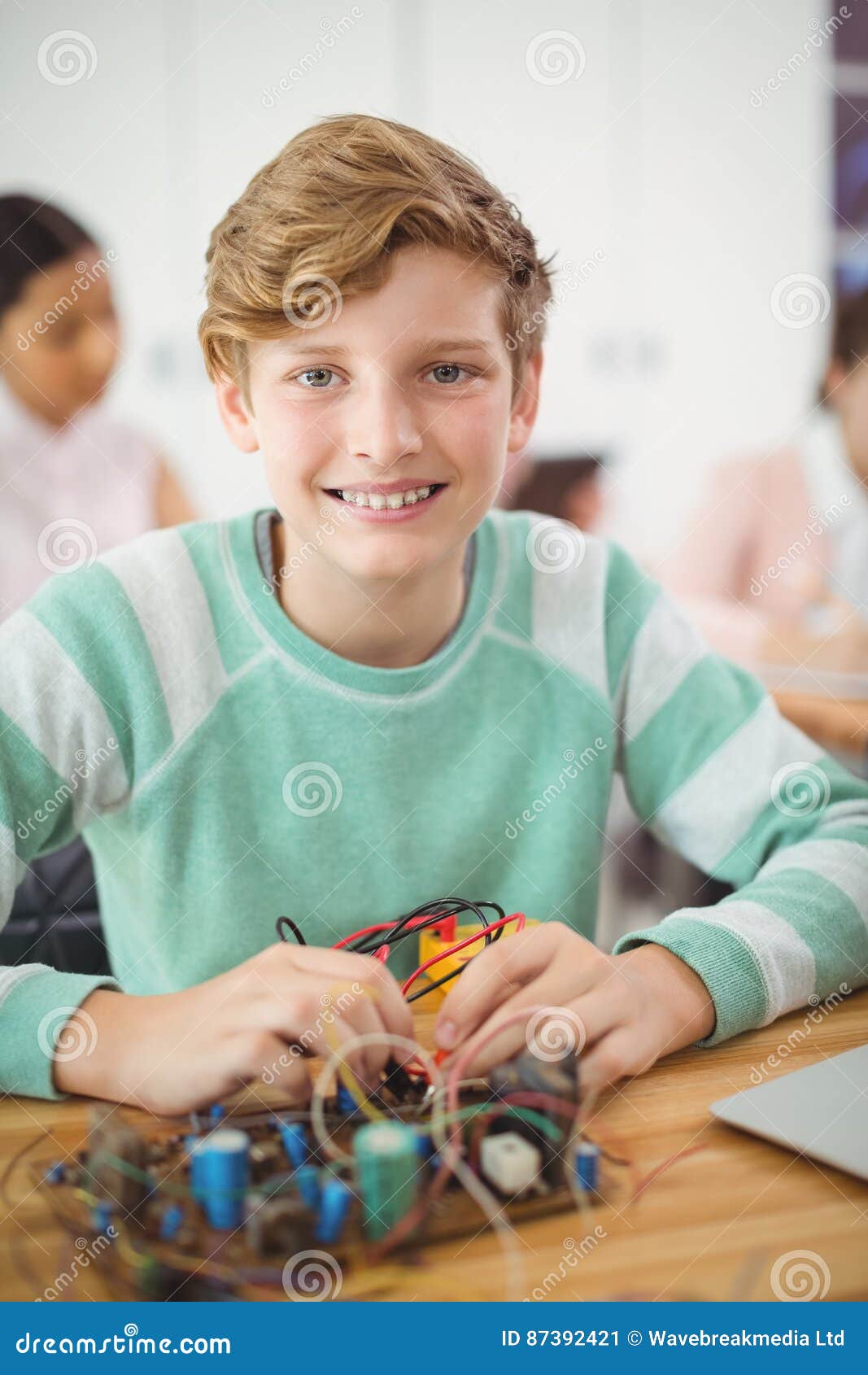 Portrait of Smiling Schoolboy Working on Electronic Project Stock Image ...