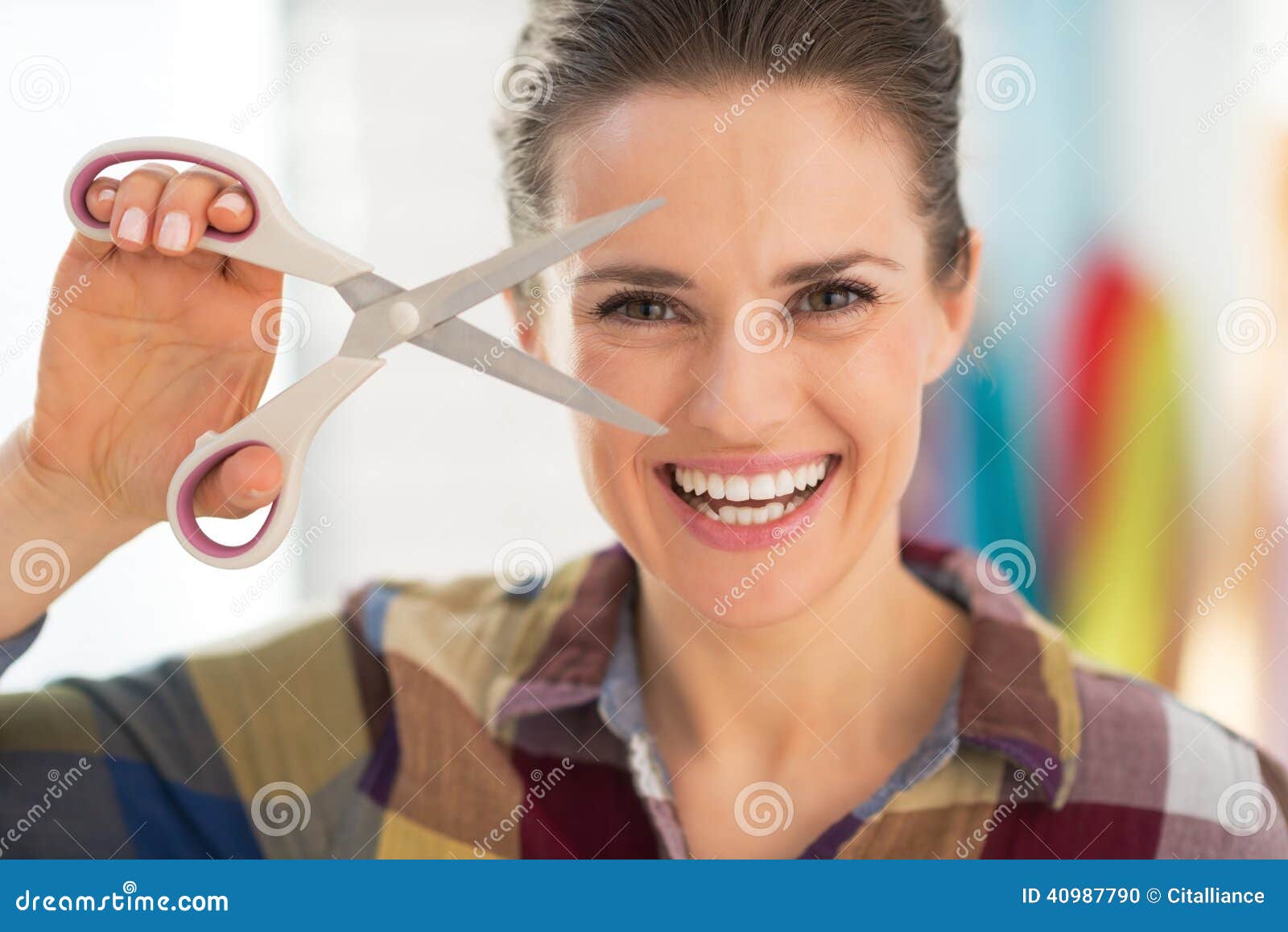 Portrait of Smiling Seamstress Showing Scissors Stock Photo - Image of ...