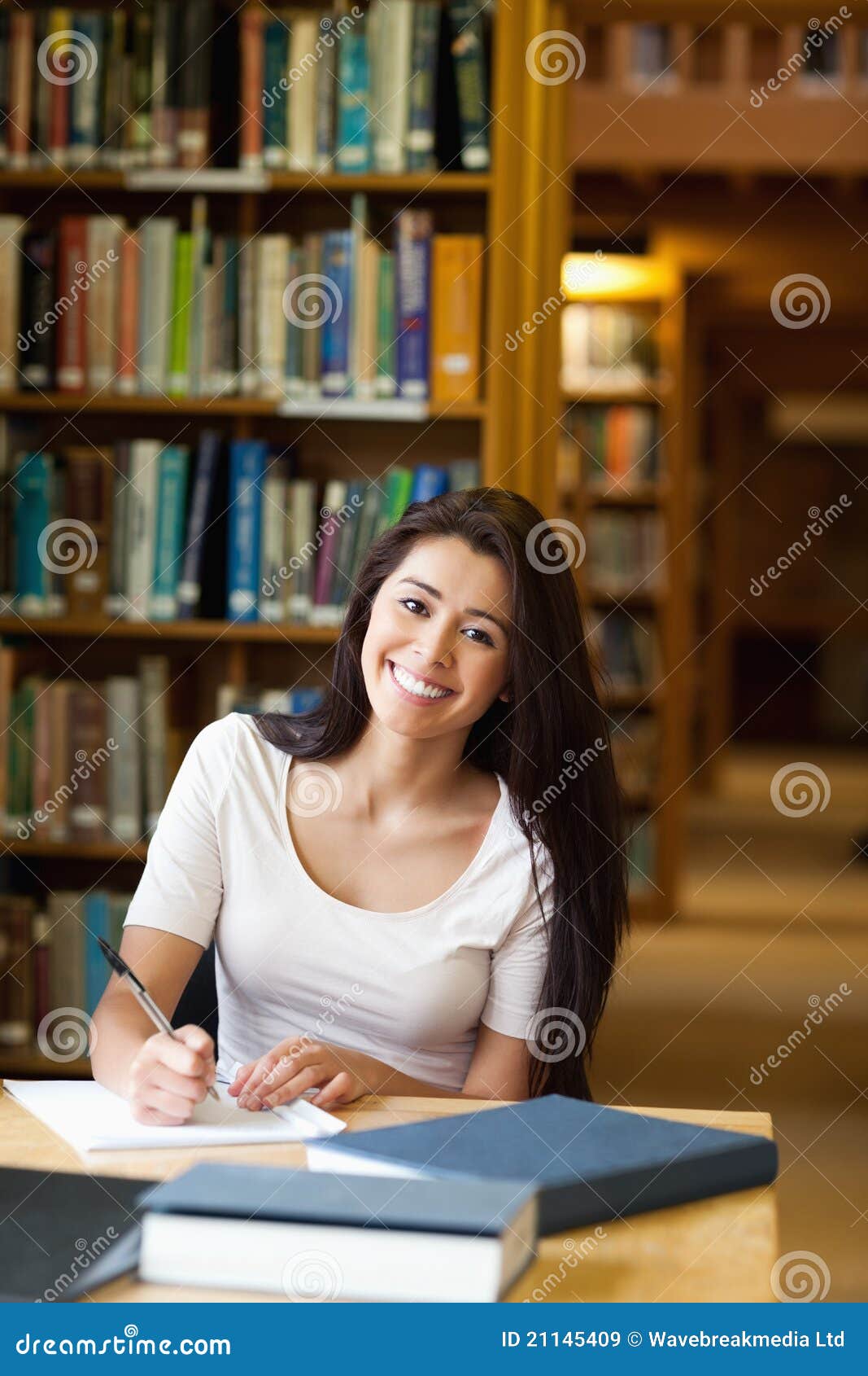 Portrait of a Smiling Student Writing a Paper Stock Image - Image of ...
