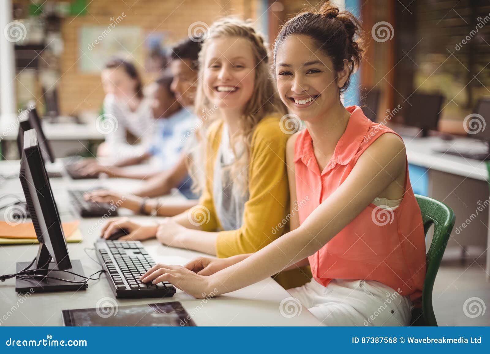 Portrait of Smiling Students Studying in Computer Classroom Stock Photo ...