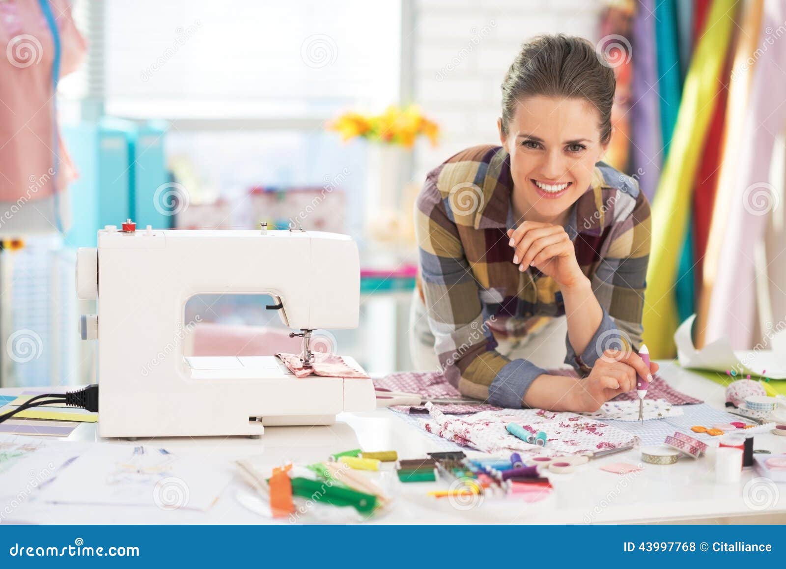 Portrait of Smiling Tailor Near Sewing Machine Stock Photo - Image of ...