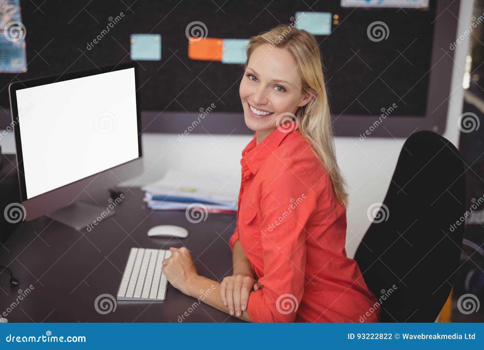 Portrait of Smiling Teacher Sitting at Desk Stock Photo - Image of desk ...