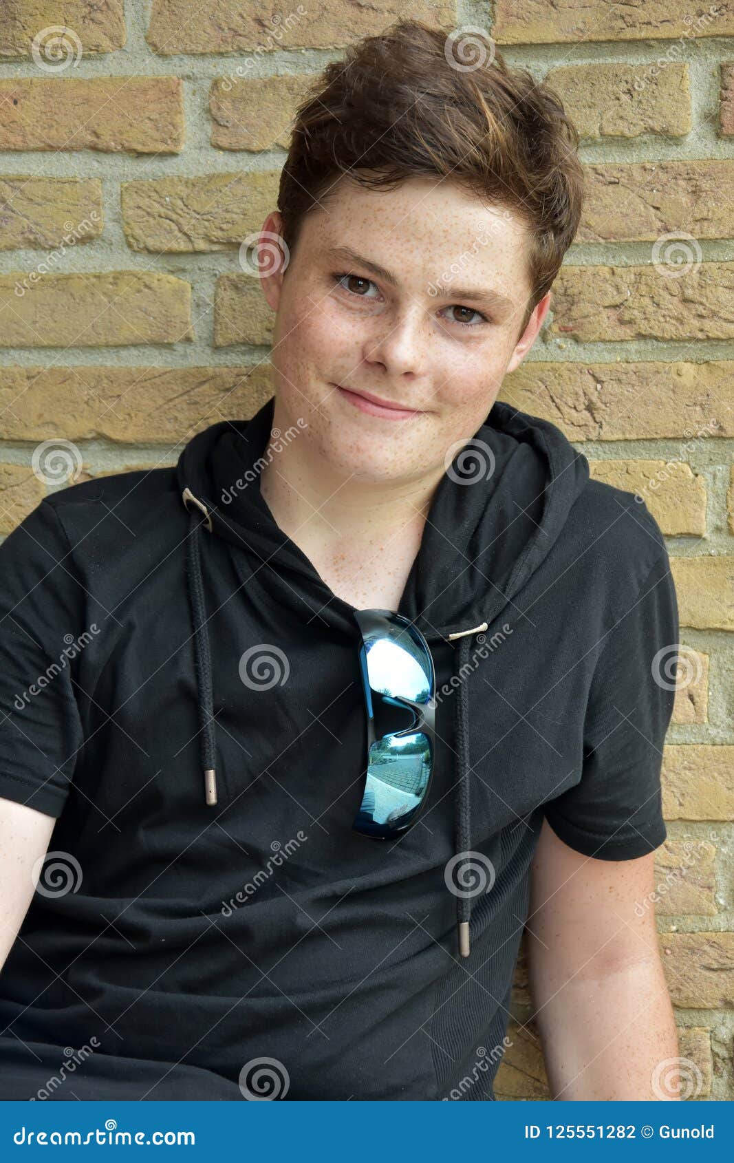 Portrait of a Smiling Teenage Boy Stock Photo - Image of black, fashion ... Portrait of a Smiling Teenage Boy Stock Photo - Image of black, fashion ...