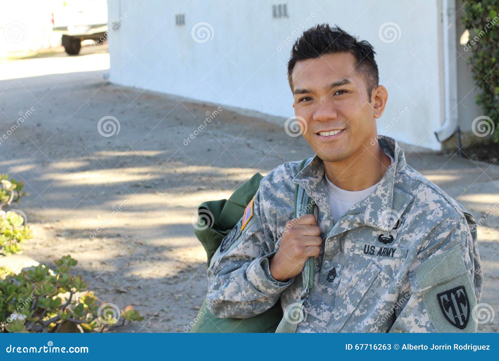 The Portrait of the Smiling US Army Soldier with Copy Space on the Left ...