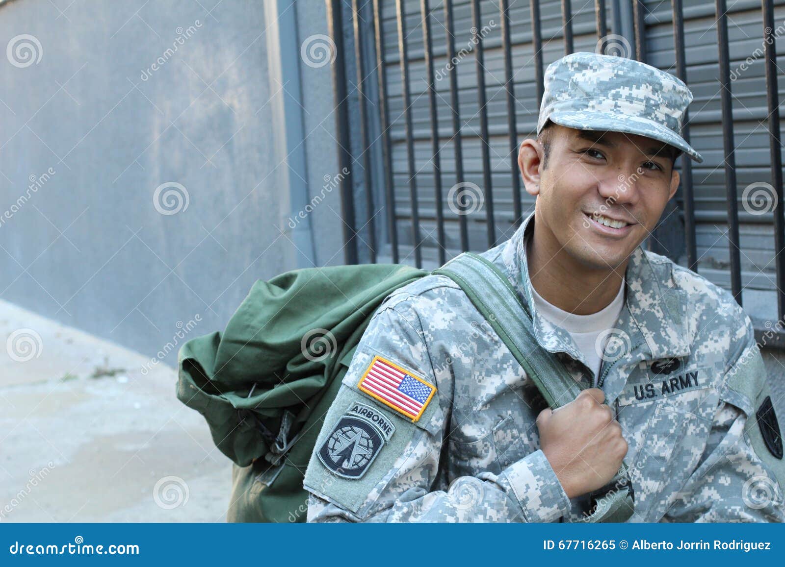 The Portrait of the Smiling US Army Soldier with Copy Space on the Left ...