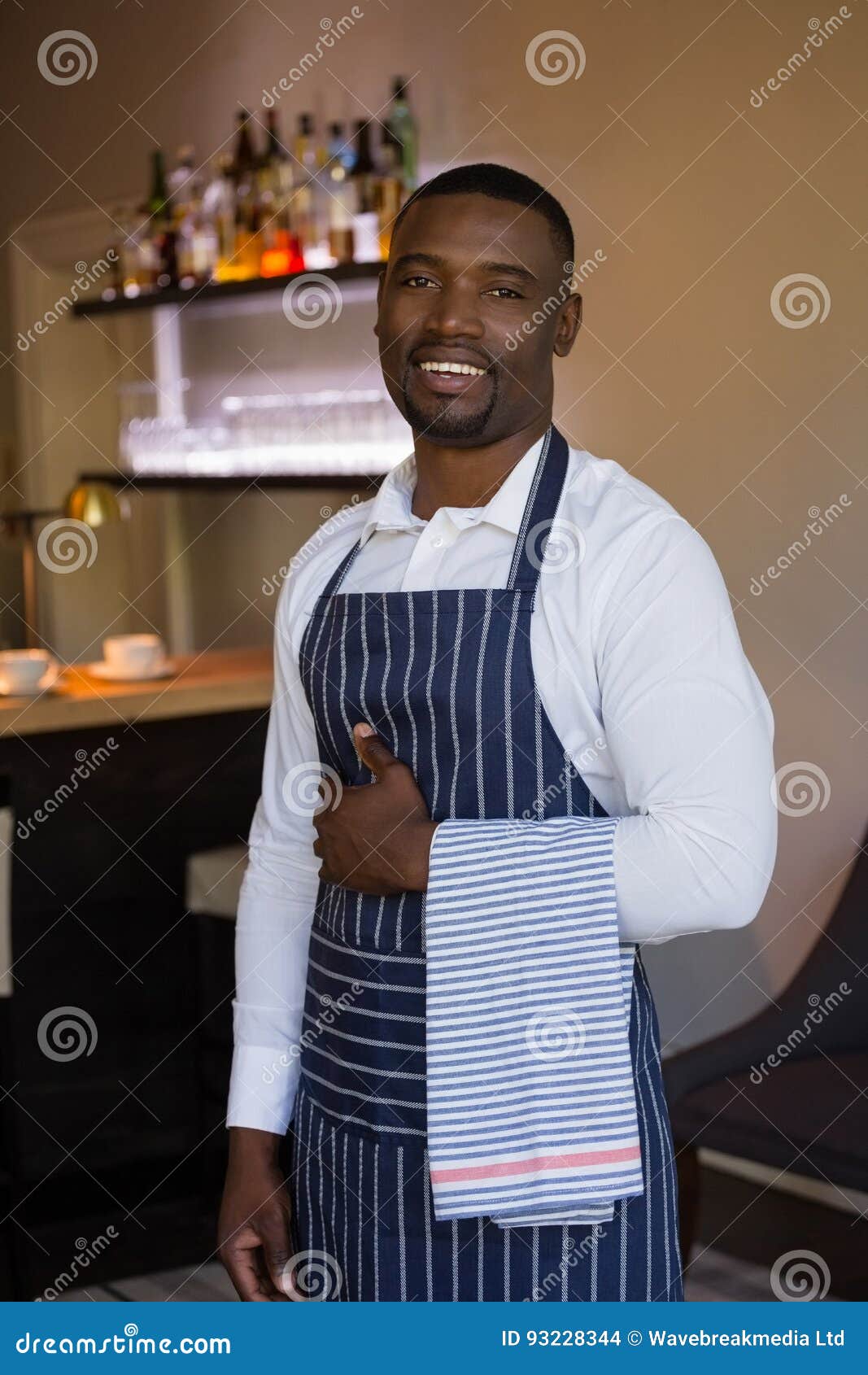Portrait of Smiling Waiter Standing with Towel Stock Photo - Image of ...