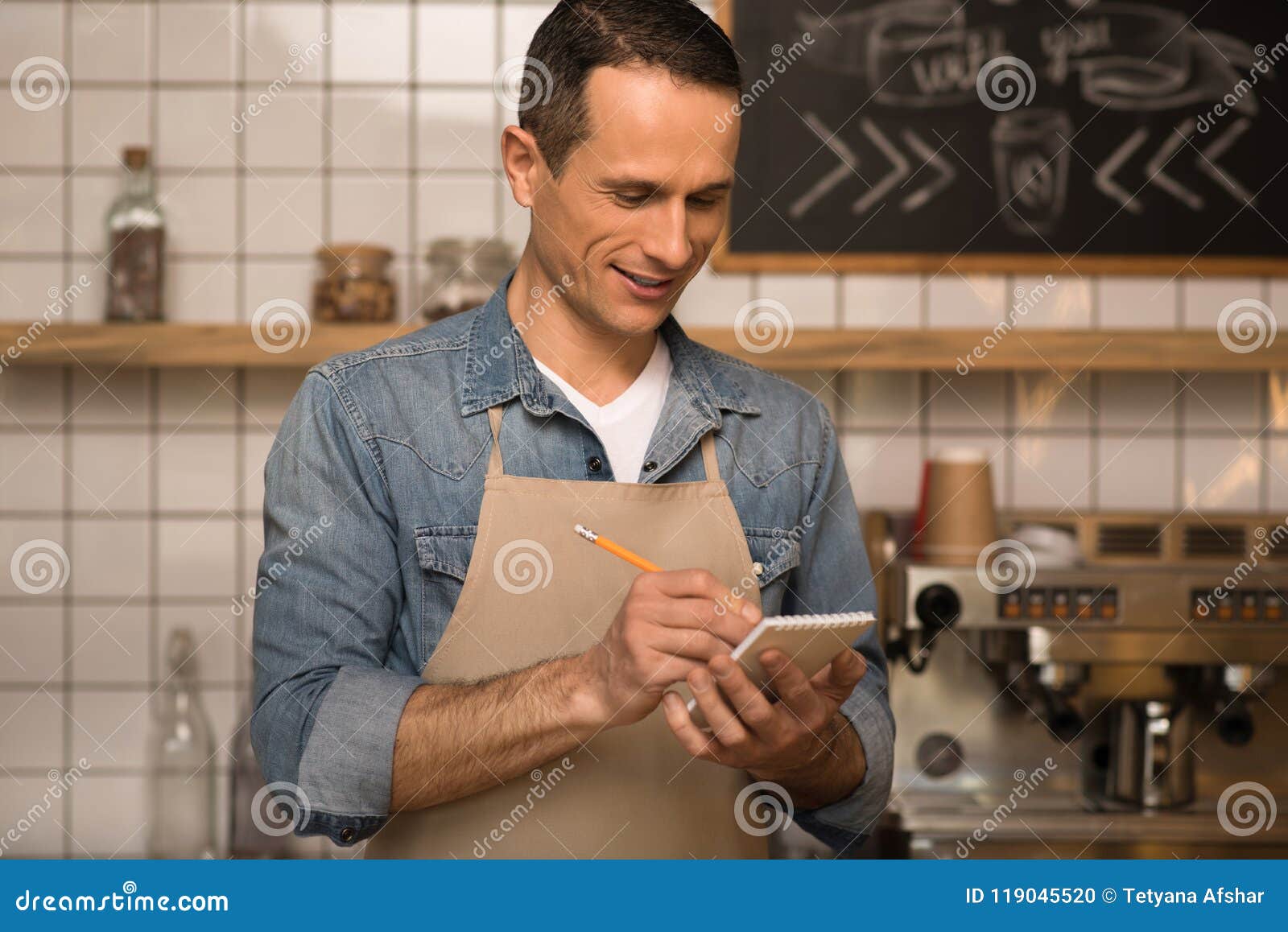 Waiter taking notes stock photo. Image of adult, owner - 119045520