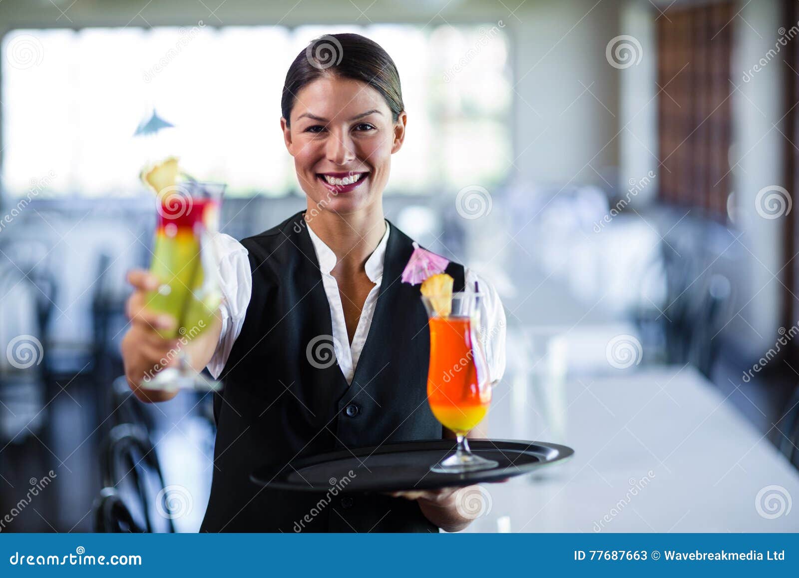Portrait of Smiling Waitress Serving Cocktail Stock Image - Image of ...
