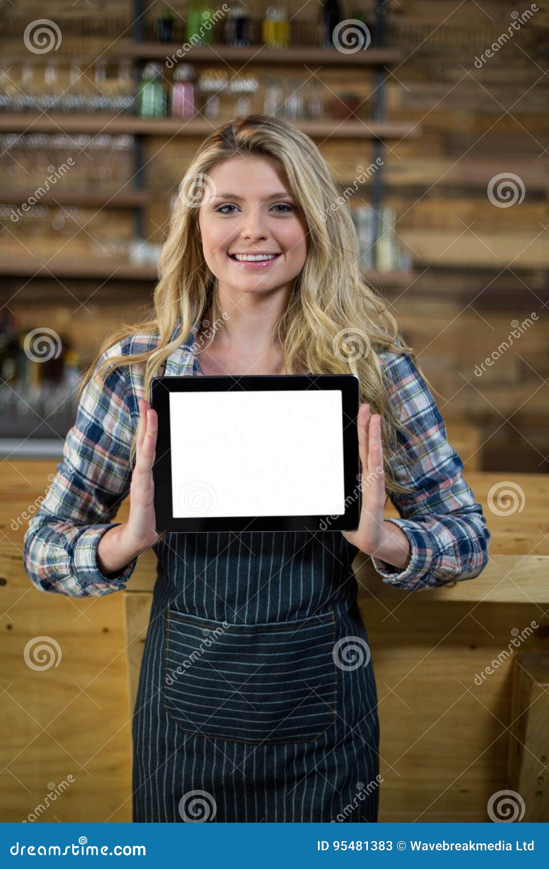 Portrait of Smiling Waitress Showing Digital Tablet Stock Image - Image ...