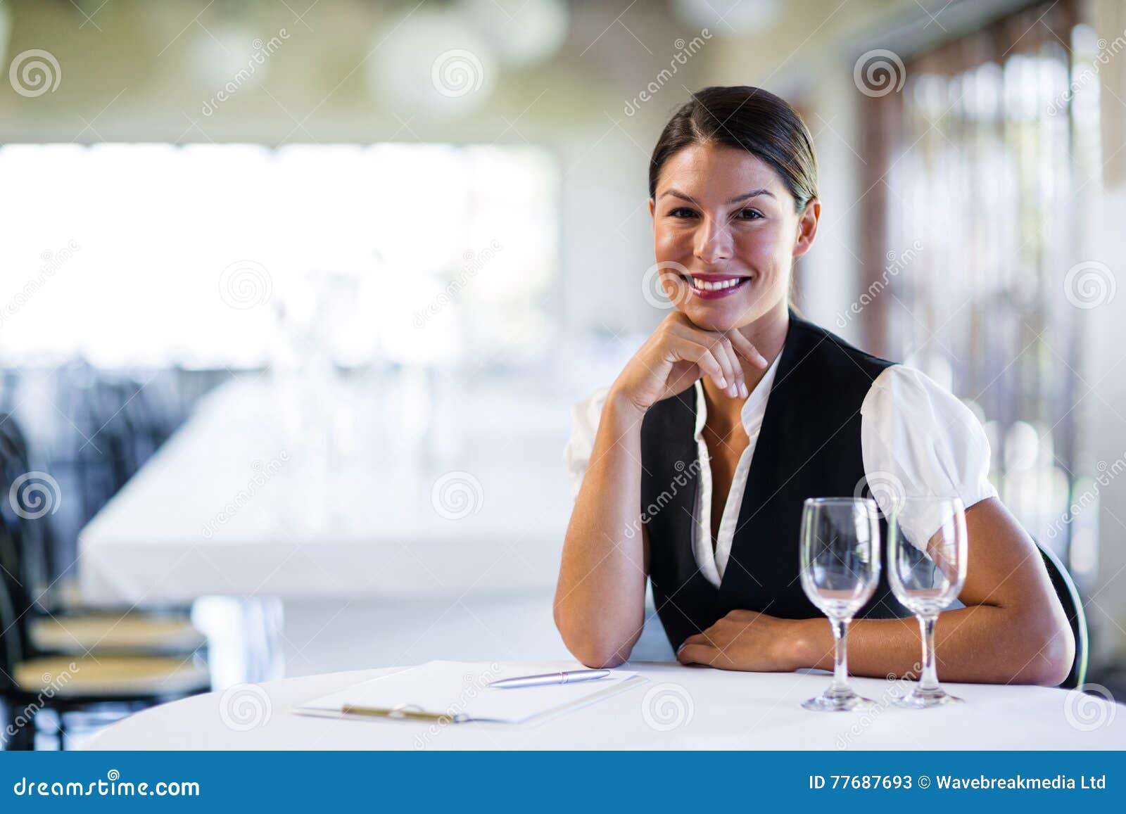 Portrait of Smiling Waitress Sitting at the Table Stock Image - Image ...