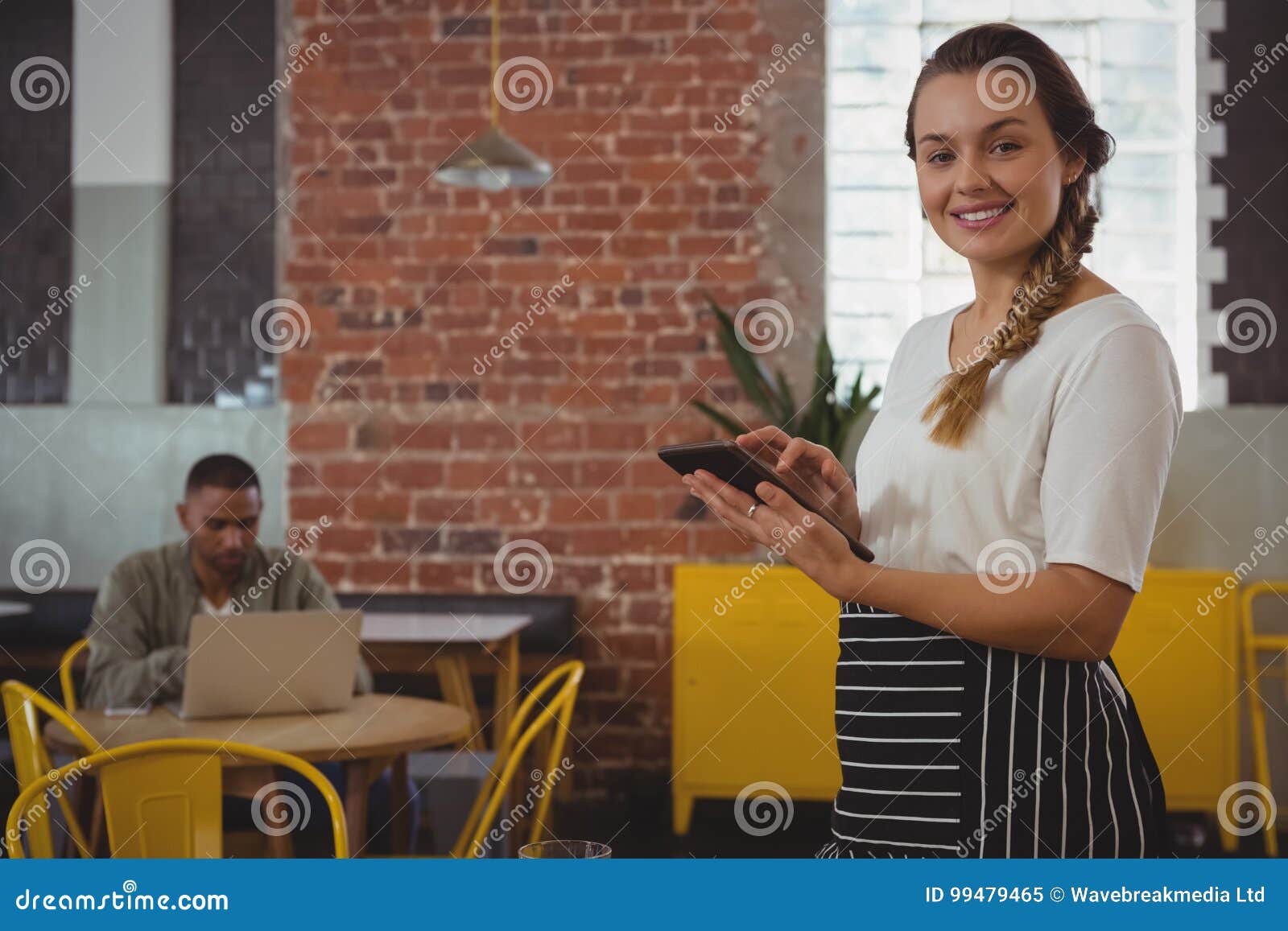 Portrait of Smiling Waitress Using Digital Tablet Stock Image - Image ...
