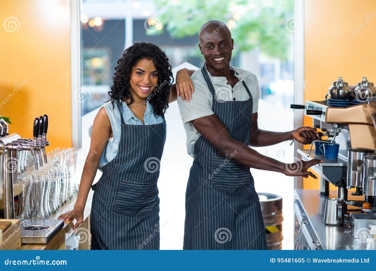 Portrait of Smiling Waitress and Waiter Working at Counter Stock Image ...