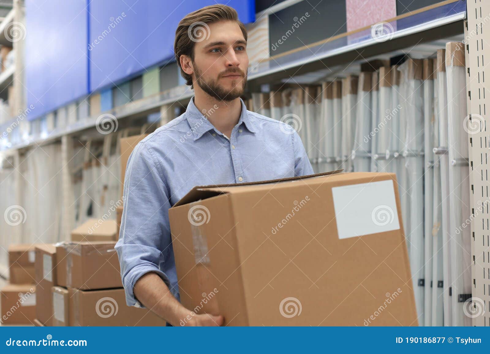 Portrait of a Smiling Warehouse Keeper at Work Stock Image - Image of ...