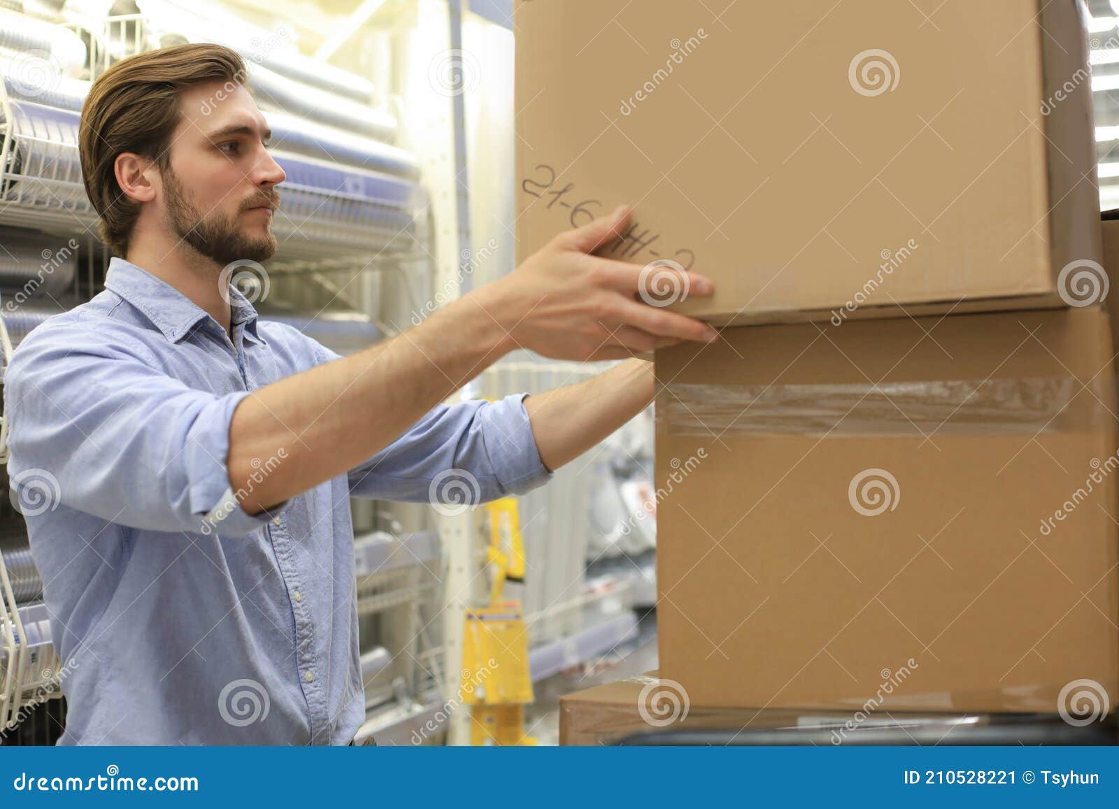 Portrait of a Smiling Warehouse Keeper at Work Stock Image - Image of ...