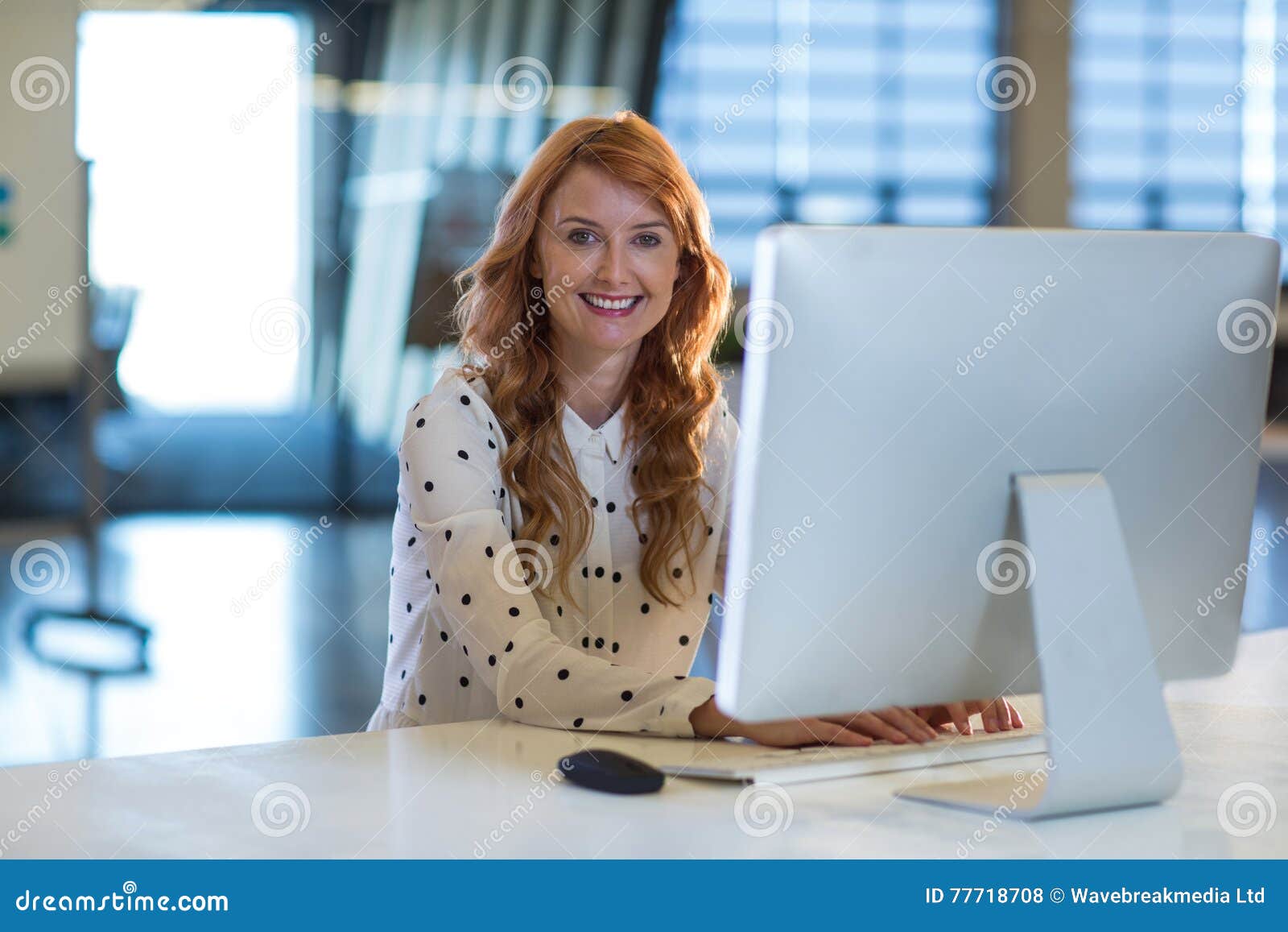 Portrait of Smiling Woman Using Computer Stock Photo - Image of looking ...