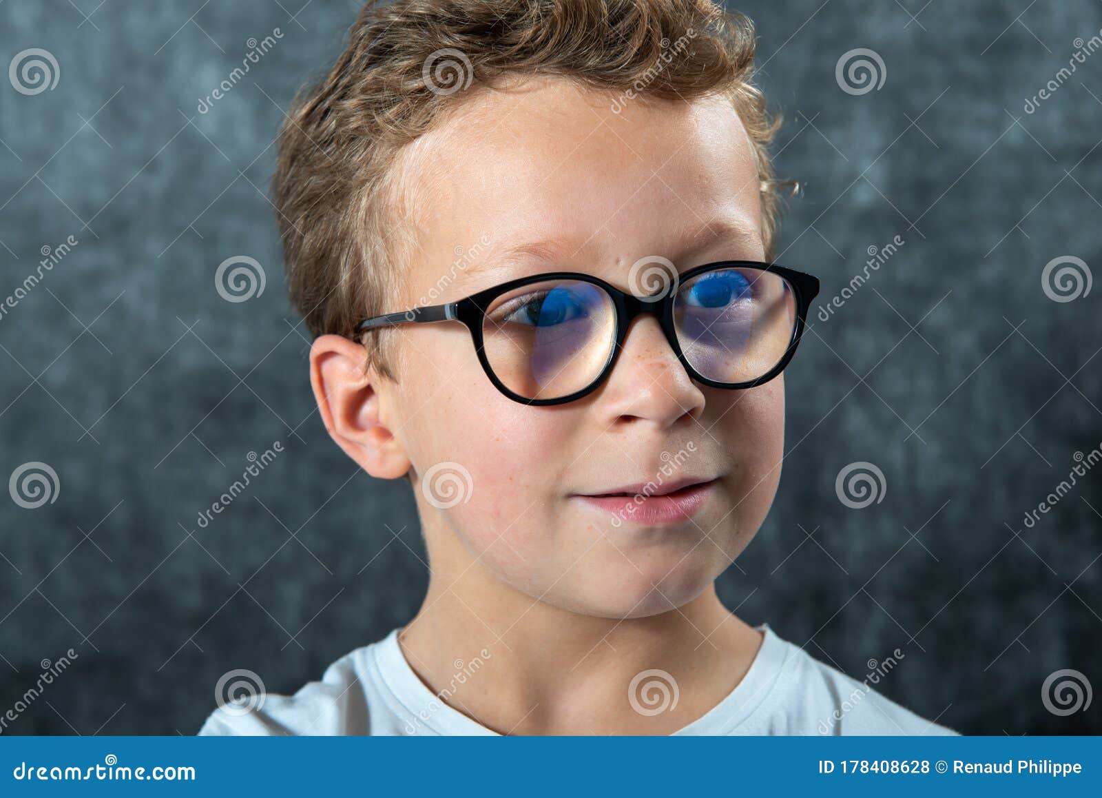 Portrait of Smiling Young Boy with Eyeglasses Stock Photo - Image of ...