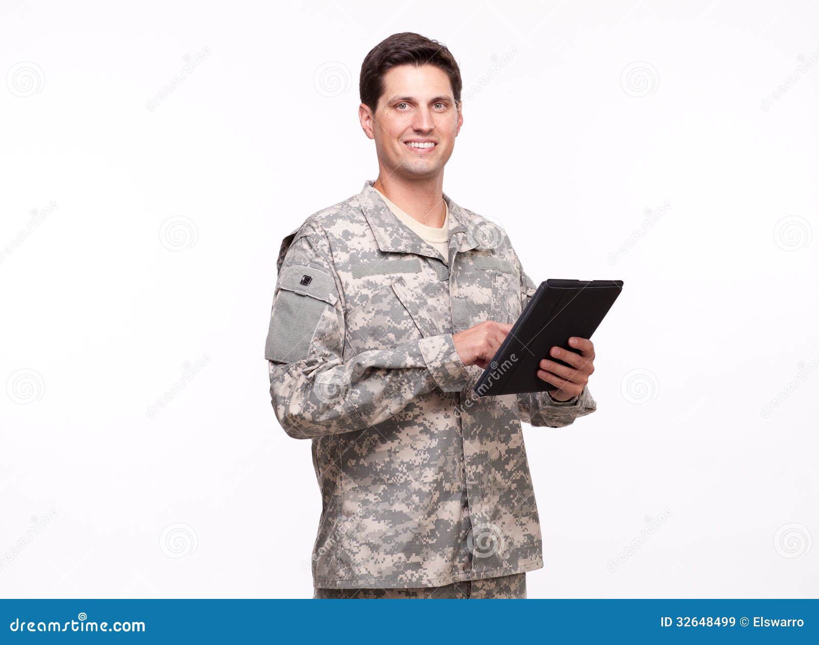 Portrait of a Smiling Young Soldier Using a Digital Tablet Stock Image ...
