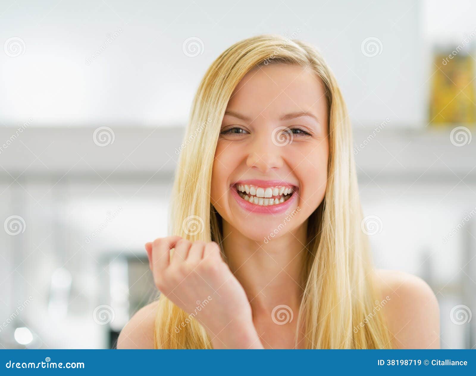 Portrait of Smiling Young Woman in Kitchen Stock Image - Image of ...