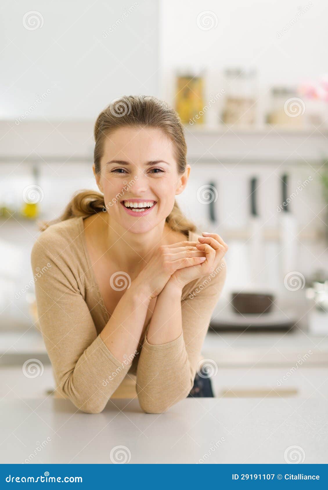 Portrait of Smiling Young Woman in Modern Kitchen Stock Image - Image ...
