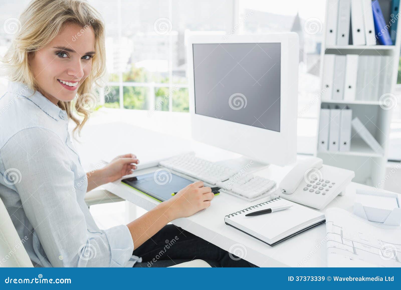 Portrait of a Smiling Young Woman Using Computer Stock Image - Image of ...